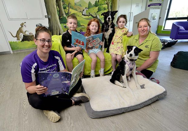 Rescue dogs enjoy storytime with young readers - The Solihull Observer